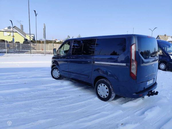 Blue Ford Tourneo Custom 2013 in Marijampole, with an engine capacity of 2.20 L and mileage of 370 thousand km for 11300 €, photo 4 on AUTOMOTO.COM.LV