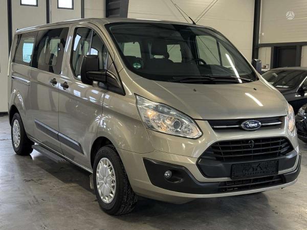 Brown Ford Tourneo Custom 2013 in Marijampole, with an engine capacity of 2.20 L and mileage of 258 thousand km for 11200 €, photo 1 on AUTOMOTO.COM.LV