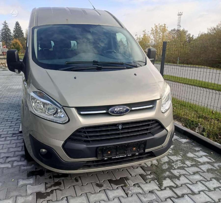 Brown Ford Tourneo Custom 2014 in Plunge, with an engine capacity of 2.20 L and mileage of 275 thousand km for 6500 €, photo 1 on AUTOMOTO.COM.LV