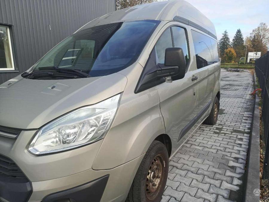 Brown Ford Tourneo Custom 2014 in Plunge, with an engine capacity of 2.20 L and mileage of 275 thousand km for 6500 €, photo 2 on AUTOMOTO.COM.LV