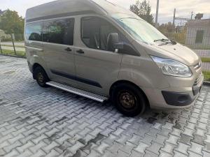 Brown Ford Tourneo Custom 2014 in Plunge, with an engine capacity of 2.20 L and mileage of 275 thousand km for 6500 €, photo 12 on AUTOMOTO.COM.LV