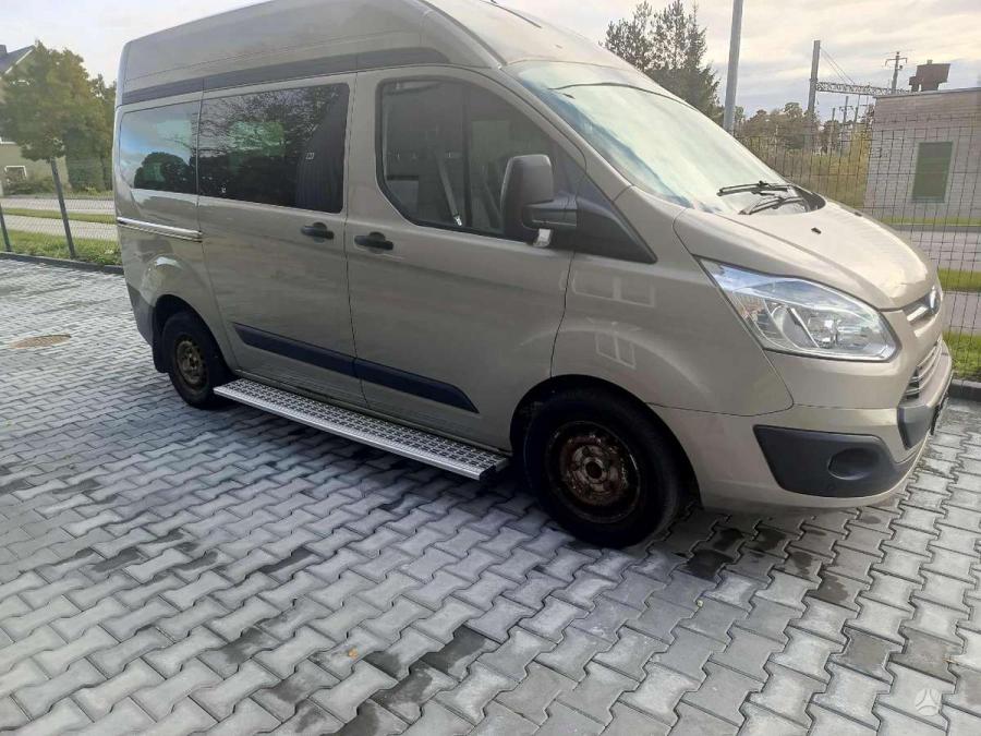 Brown Ford Tourneo Custom 2014 in Plunge, with an engine capacity of 2.20 L and mileage of 275 thousand km for 6500 €, photo 12 on AUTOMOTO.COM.LV