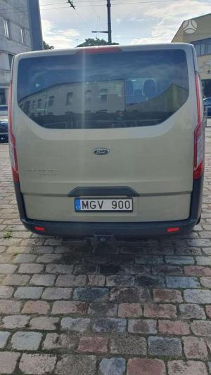 Brown Ford Tourneo Custom 2014 in Kaunas, with an engine capacity of 2.20 L and mileage of 315 thousand km for 11000 €, photo 5 on AUTOMOTO.COM.LV