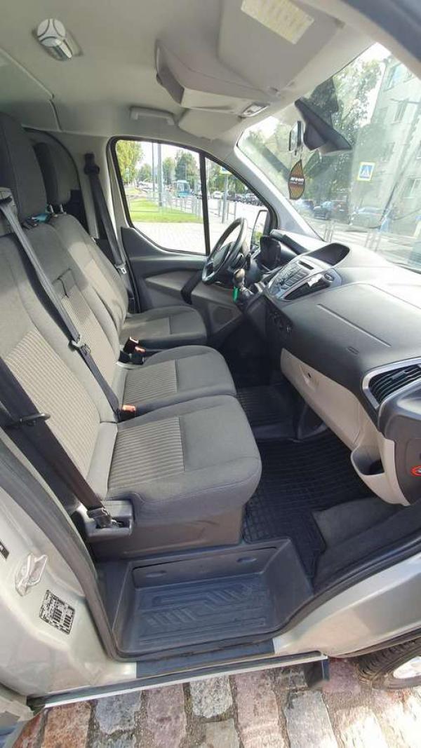 Brown Ford Tourneo Custom 2014 in Kaunas, with an engine capacity of 2.20 L and mileage of 315 thousand km for 11000 €, photo 9 on AUTOMOTO.COM.LV