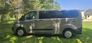 Grey Ford Tourneo Custom 2013 in Ukmerge, with an engine capacity of 2.20 L and mileage of 264 thousand km for 10400 €, photo 3 on AUTOMOTO.COM.LV