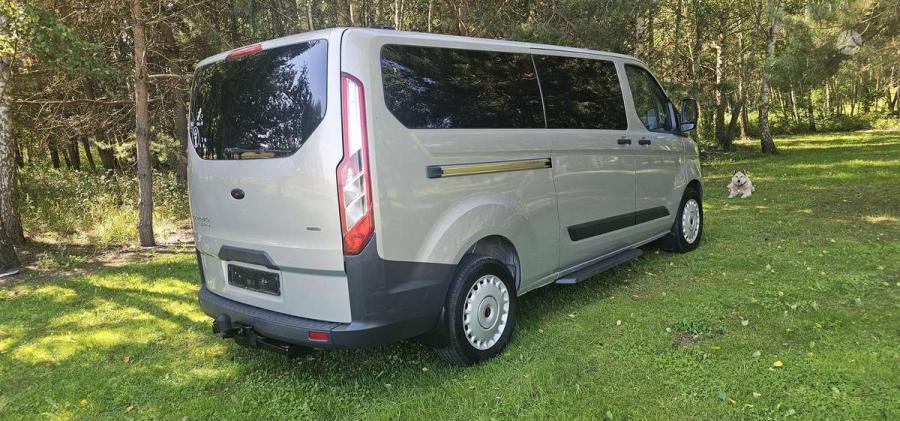 Grey Ford Tourneo Custom 2013 in Ukmerge, with an engine capacity of 2.20 L and mileage of 264 thousand km for 10400 €, photo 6 on AUTOMOTO.COM.LV