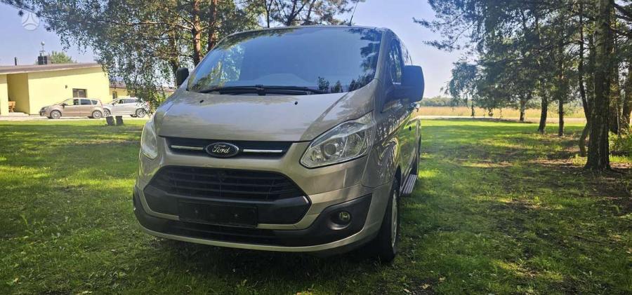 Grey Ford Tourneo Custom 2013 in Ukmerge, with an engine capacity of 2.20 L and mileage of 264 thousand km for 10400 €, photo 9 on AUTOMOTO.COM.LV