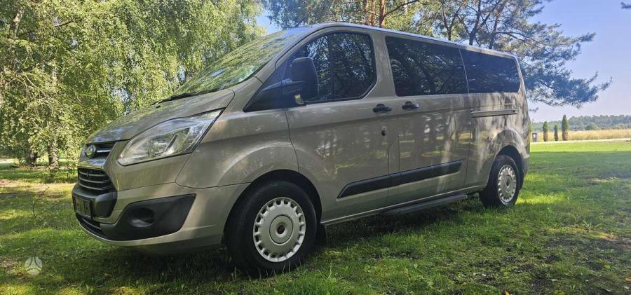 Grey Ford Tourneo Custom 2013 in Ukmerge, with an engine capacity of 2.20 L and mileage of 264 thousand km for 10400 €, photo 12 on AUTOMOTO.COM.LV