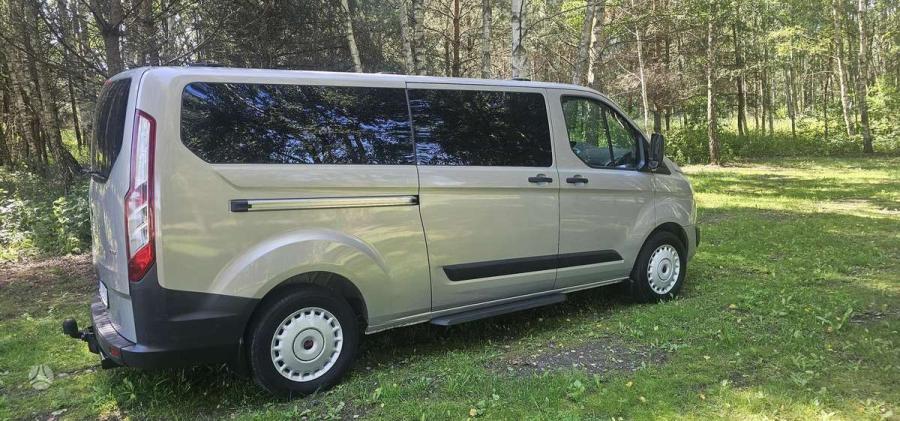 Grey Ford Tourneo Custom 2013 in Ukmerge, with an engine capacity of 2.20 L and mileage of 264 thousand km for 10400 €, photo 13 on AUTOMOTO.COM.LV
