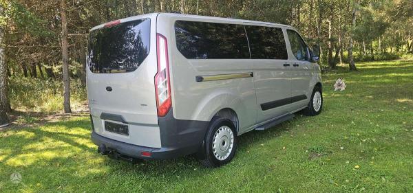 Grey Ford Tourneo Custom 2013 in Ukmerge, with an engine capacity of 2.20 L and mileage of 264 thousand km for 10400 €, photo 8 on AUTOMOTO.COM.LV