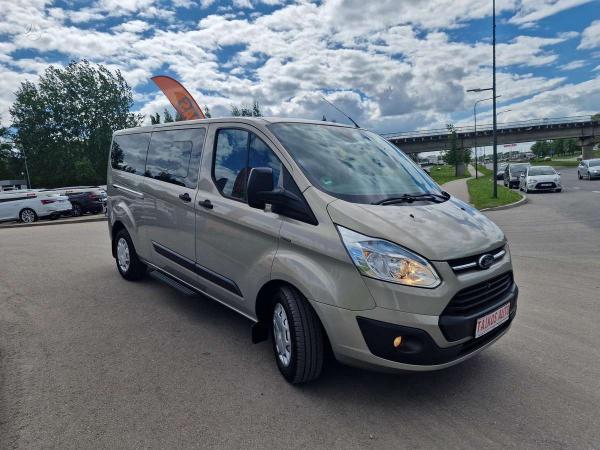 Grey Ford Tourneo Custom 2015 in Kaunas, with an engine capacity of 2.20 L and mileage of 290 thousand km for 11790 €, photo 1 on AUTOMOTO.COM.LV