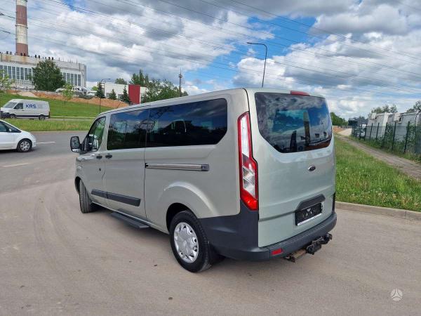 Grey Ford Tourneo Custom 2015 in Kaunas, with an engine capacity of 2.20 L and mileage of 290 thousand km for 11790 €, photo 10 on AUTOMOTO.COM.LV