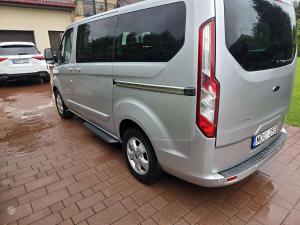 Grey Ford Tourneo Custom 2015 in Salcininkai, with an engine capacity of 2.20 L and mileage of 309 thousand km for 8500 €, photo 4 on AUTOMOTO.COM.LV