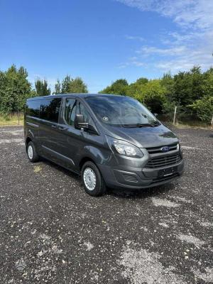 Grey Ford Tourneo Custom 2015 in Kretinga, with an engine capacity of 2.20 L and mileage of 240 thousand km for 10999 €, photo  on AUTOMOTO.COM.LV