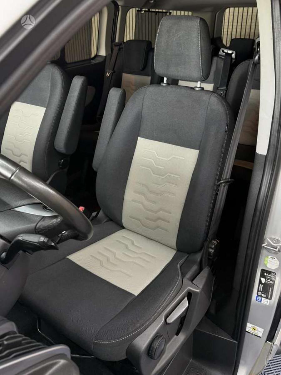 Grey Ford Tourneo Custom 2017 in Marijampole, with an engine capacity of 2.00 L and mileage of 119 thousand km for 15900 €, photo 16 on AUTOMOTO.COM.LV