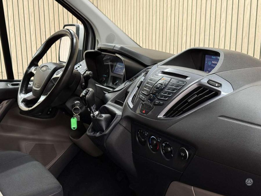 Grey Ford Tourneo Custom 2017 in Marijampole, with an engine capacity of 2.00 L and mileage of 119 thousand km for 15900 €, photo 18 on AUTOMOTO.COM.LV