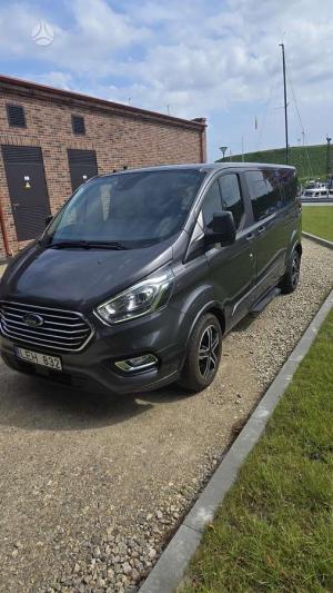 Grey Ford Tourneo Custom 2019 in Klaipeda, with an engine capacity of 2.00 L and mileage of 120 thousand km for 22700 €, photo 3 on AUTOMOTO.COM.LV