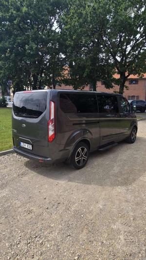 Grey Ford Tourneo Custom 2019 in Klaipeda, with an engine capacity of 2.00 L and mileage of 120 thousand km for 22700 €, photo 4 on AUTOMOTO.COM.LV