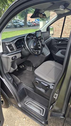 Grey Ford Tourneo Custom 2019 in Klaipeda, with an engine capacity of 2.00 L and mileage of 120 thousand km for 22700 €, photo 7 on AUTOMOTO.COM.LV