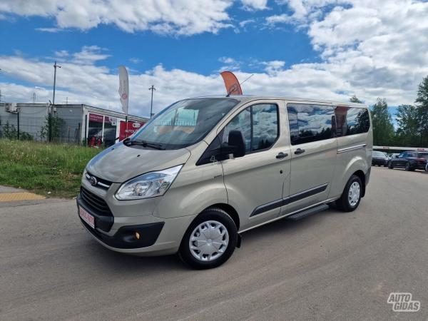 Grey Ford Tourneo Custom 2015 in Kaunas, with an engine capacity of 2.20 L and mileage of 290 thousand km for 12990 €, photo 1 on AUTOMOTO.COM.LV