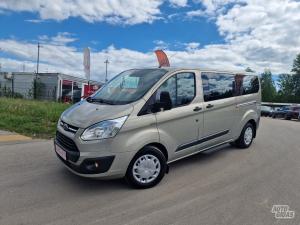 Grey Ford Tourneo Custom 2015 in Kaunas, with an engine capacity of 2.20 L and mileage of 290 thousand km for 12990 €, photo  on AUTOMOTO.COM.LV
