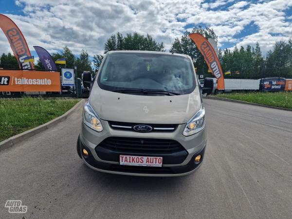 Grey Ford Tourneo Custom 2015 in Kaunas, with an engine capacity of 2.20 L and mileage of 290 thousand km for 12990 €, photo 2 on AUTOMOTO.COM.LV