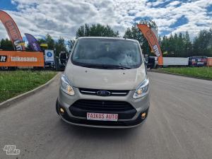 Grey Ford Tourneo Custom 2015 in Kaunas, with an engine capacity of 2.20 L and mileage of 290 thousand km for 12990 €, photo 3 on AUTOMOTO.COM.LV