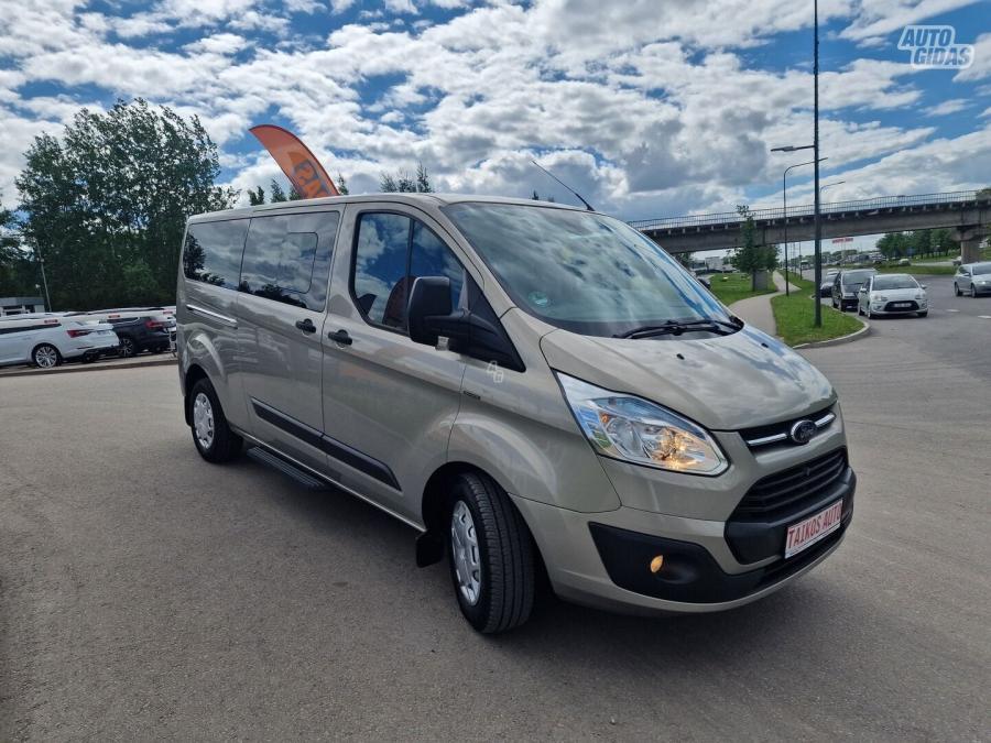 Grey Ford Tourneo Custom 2015 in Kaunas, with an engine capacity of 2.20 L and mileage of 290 thousand km for 12990 €, photo 4 on AUTOMOTO.COM.LV