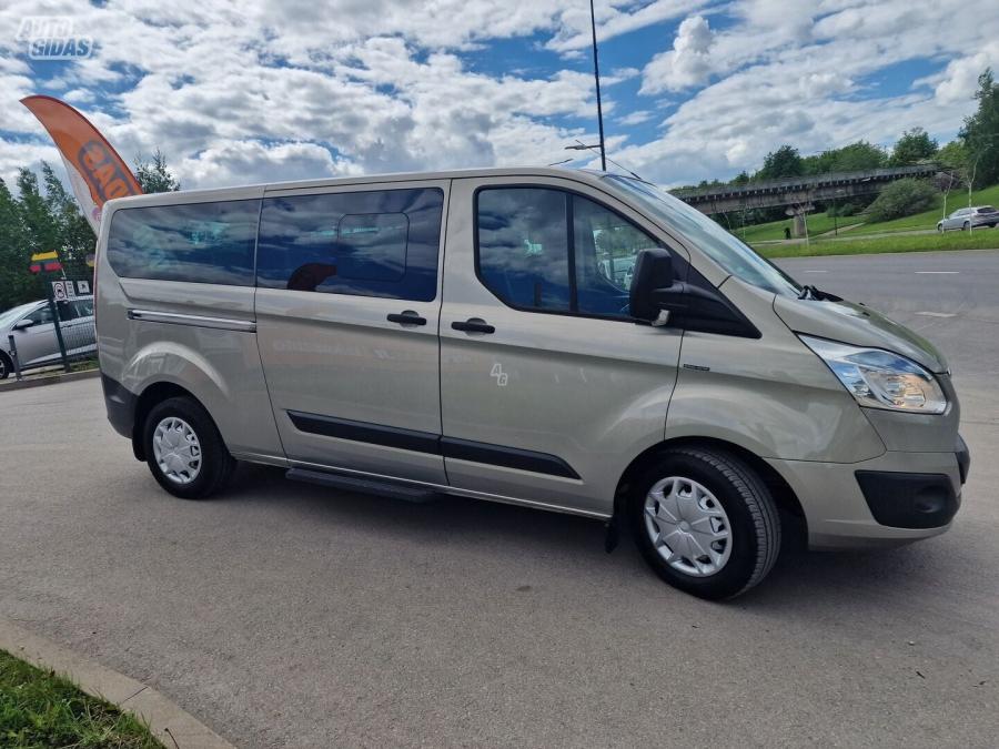 Grey Ford Tourneo Custom 2015 in Kaunas, with an engine capacity of 2.20 L and mileage of 290 thousand km for 12990 €, photo 6 on AUTOMOTO.COM.LV