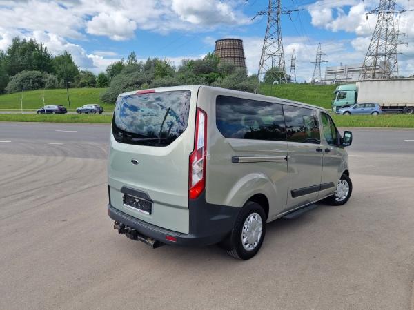 Grey Ford Tourneo Custom 2015 in Kaunas, with an engine capacity of 2.20 L and mileage of 290 thousand km for 12990 €, photo 8 on AUTOMOTO.COM.LV