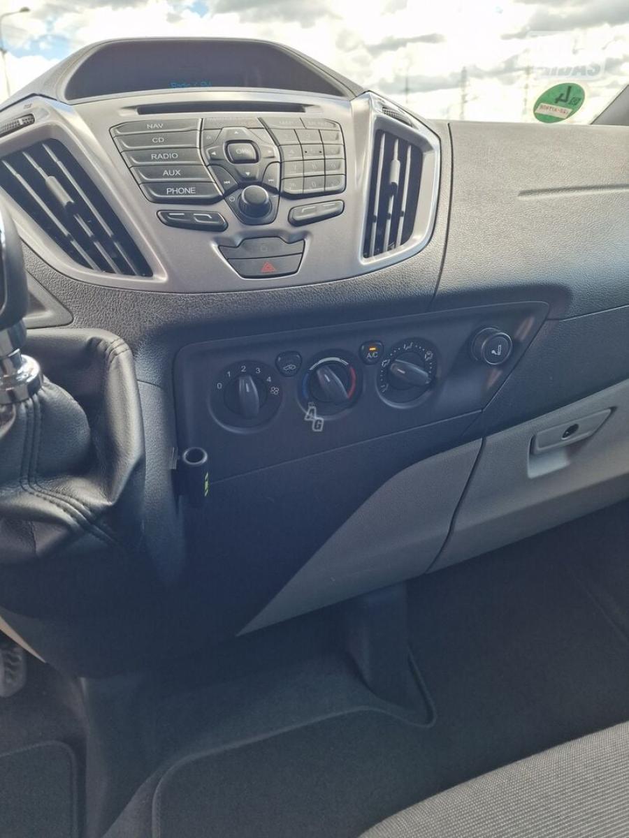 Grey Ford Tourneo Custom 2015 in Kaunas, with an engine capacity of 2.20 L and mileage of 290 thousand km for 12990 €, photo 19 on AUTOMOTO.COM.LV