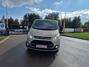 Grey Ford Tourneo Custom 2015 in Kaunas, with an engine capacity of 2.20 L and mileage of 290 thousand km for 12990 €, photo 3 on AUTOMOTO.COM.LV