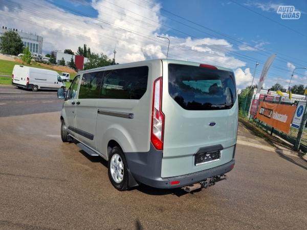 Grey Ford Tourneo Custom 2015 in Kaunas, with an engine capacity of 2.20 L and mileage of 290 thousand km for 12990 €, photo 10 on AUTOMOTO.COM.LV