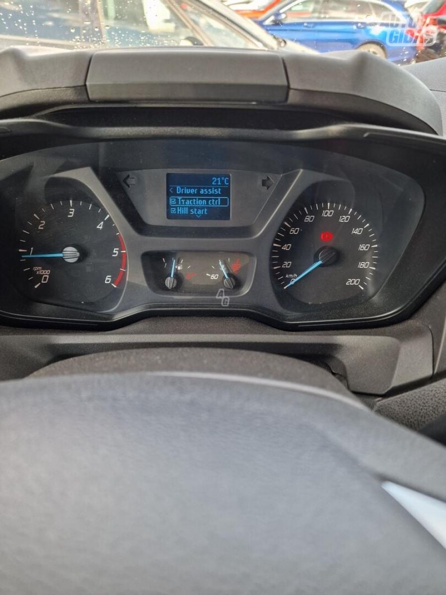 Grey Ford Tourneo Custom 2015 in Kaunas, with an engine capacity of 2.20 L and mileage of 290 thousand km for 12990 €, photo 20 on AUTOMOTO.COM.LV