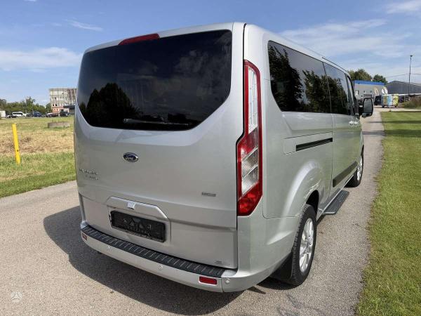 Grey Ford Tourneo Custom 2018 in Siauliai, with an engine capacity of 2.00 L and mileage of 201 thousand km for 13650 €, photo 8 on AUTOMOTO.COM.LV