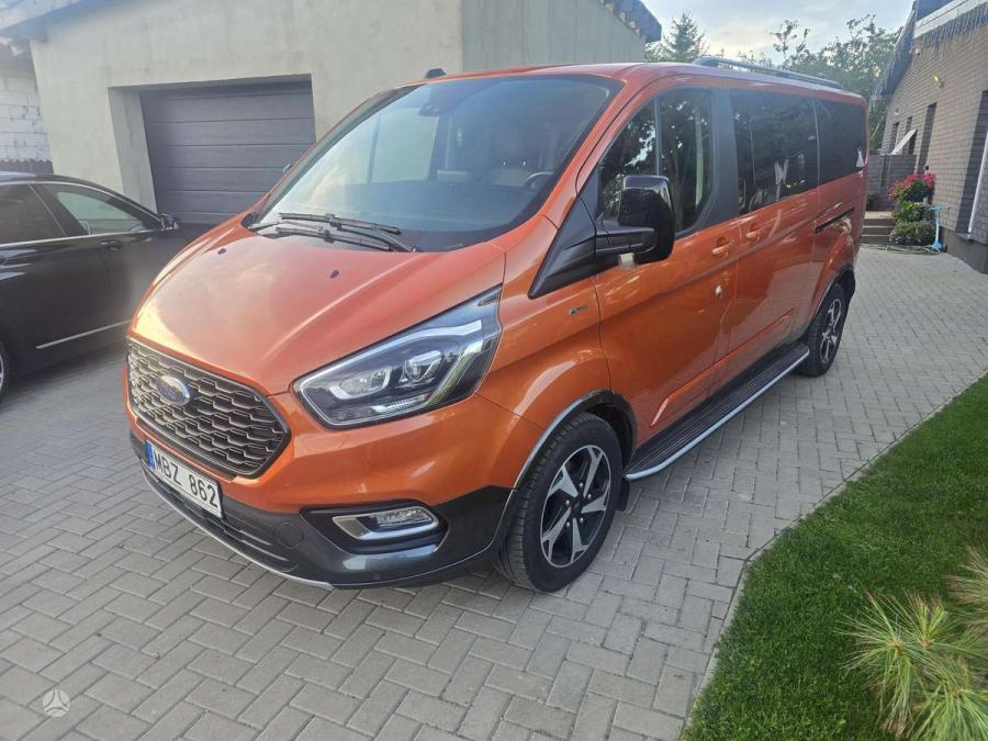Orange Ford Tourneo Custom 2021 in Vilnius, with an engine capacity of 2.00 L and mileage of 71 thousand km for 31000 €, photo 3 on AUTOMOTO.COM.LV
