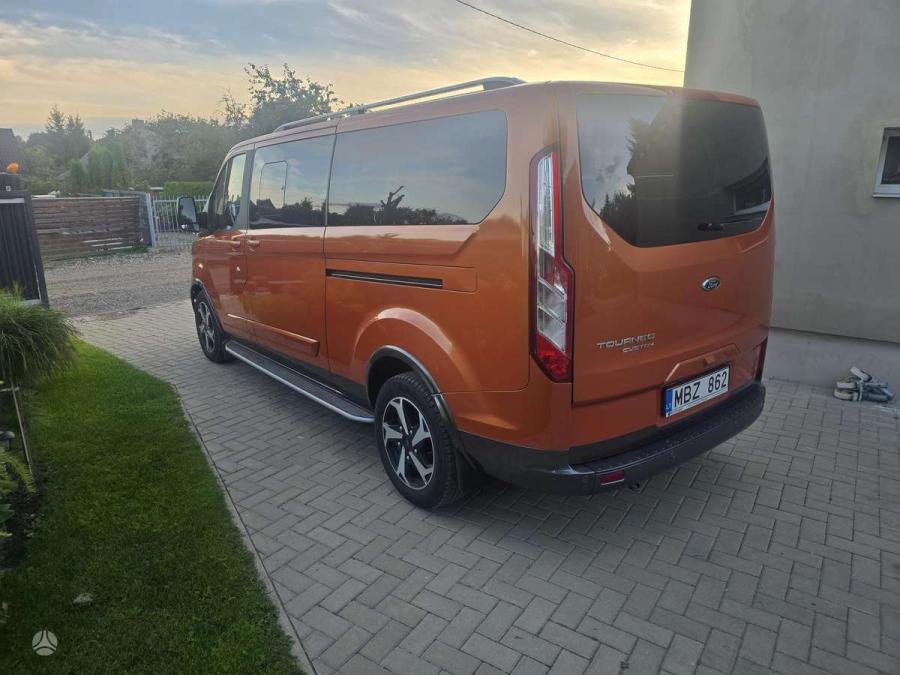 Orange Ford Tourneo Custom 2021 in Vilnius, with an engine capacity of 2.00 L and mileage of 71 thousand km for 31000 €, photo 5 on AUTOMOTO.COM.LV