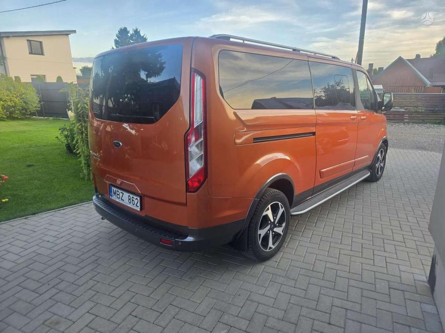 Orange Ford Tourneo Custom 2021 in Vilnius, with an engine capacity of 2.00 L and mileage of 71 thousand km for 31000 €, photo 6 on AUTOMOTO.COM.LV
