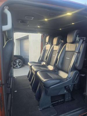 Orange Ford Tourneo Custom 2021 in Vilnius, with an engine capacity of 2.00 L and mileage of 71 thousand km for 31000 €, photo 10 on AUTOMOTO.COM.LV