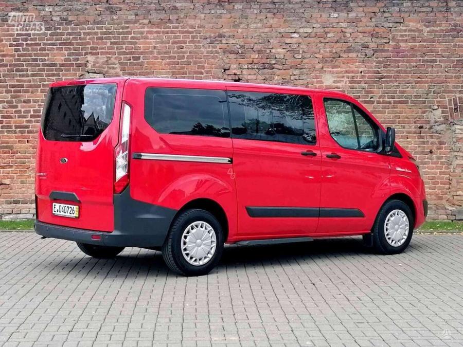 Red Ford Tourneo Custom 2015 in Vilnius, with an engine capacity of 2.20 L and mileage of 232 thousand km for 12299 €, photo 9 on AUTOMOTO.COM.LV
