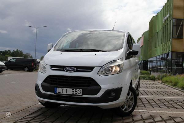 White Ford Tourneo Custom 2014 in Vilnius, with an engine capacity of 2.20 L and mileage of 252 thousand km for 11990 €, photo 8 on AUTOMOTO.COM.LV