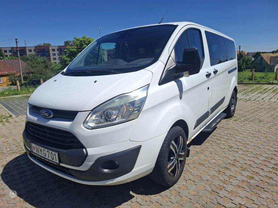 White Ford Tourneo Custom 2014 in Prienai, with an engine capacity of 2.20 L and mileage of 205 thousand km for 7900 €, photo 3 on AUTOMOTO.COM.LV