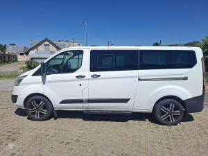 White Ford Tourneo Custom 2014 in Prienai, with an engine capacity of 2.20 L and mileage of 205 thousand km for 7900 €, photo 4 on AUTOMOTO.COM.LV
