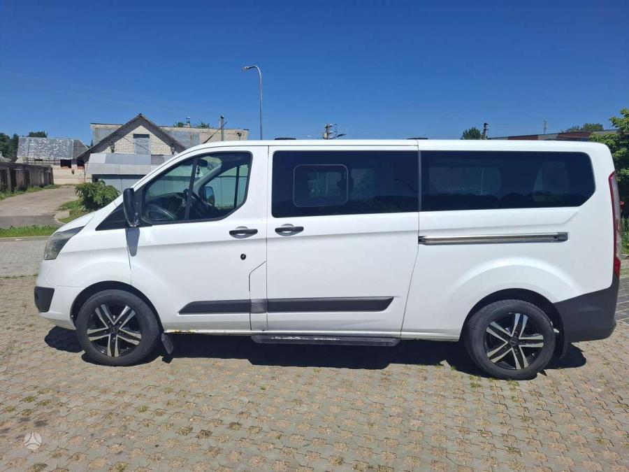 White Ford Tourneo Custom 2014 in Prienai, with an engine capacity of 2.20 L and mileage of 205 thousand km for 7900 €, photo 4 on AUTOMOTO.COM.LV