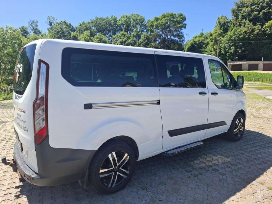 White Ford Tourneo Custom 2014 in Prienai, with an engine capacity of 2.20 L and mileage of 205 thousand km for 7900 €, photo 7 on AUTOMOTO.COM.LV