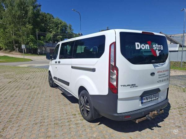 White Ford Tourneo Custom 2014 in Prienai, with an engine capacity of 2.20 L and mileage of 205 thousand km for 7900 €, photo 8 on AUTOMOTO.COM.LV