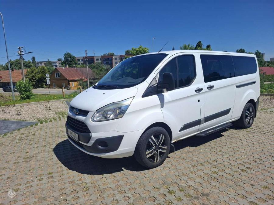 White Ford Tourneo Custom 2014 in Prienai, with an engine capacity of 2.20 L and mileage of 205 thousand km for 7900 €, photo 10 on AUTOMOTO.COM.LV