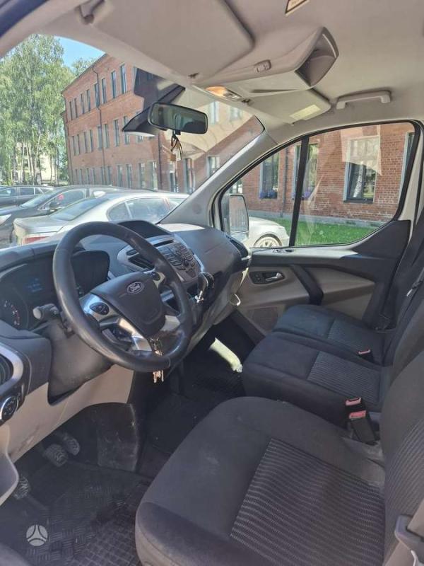 White Ford Tourneo Custom 2014 in Prienai, with an engine capacity of 2.20 L and mileage of 205 thousand km for 7900 €, photo 10 on AUTOMOTO.COM.LV