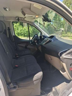 White Ford Tourneo Custom 2014 in Prienai, with an engine capacity of 2.20 L and mileage of 205 thousand km for 7900 €, photo 15 on AUTOMOTO.COM.LV