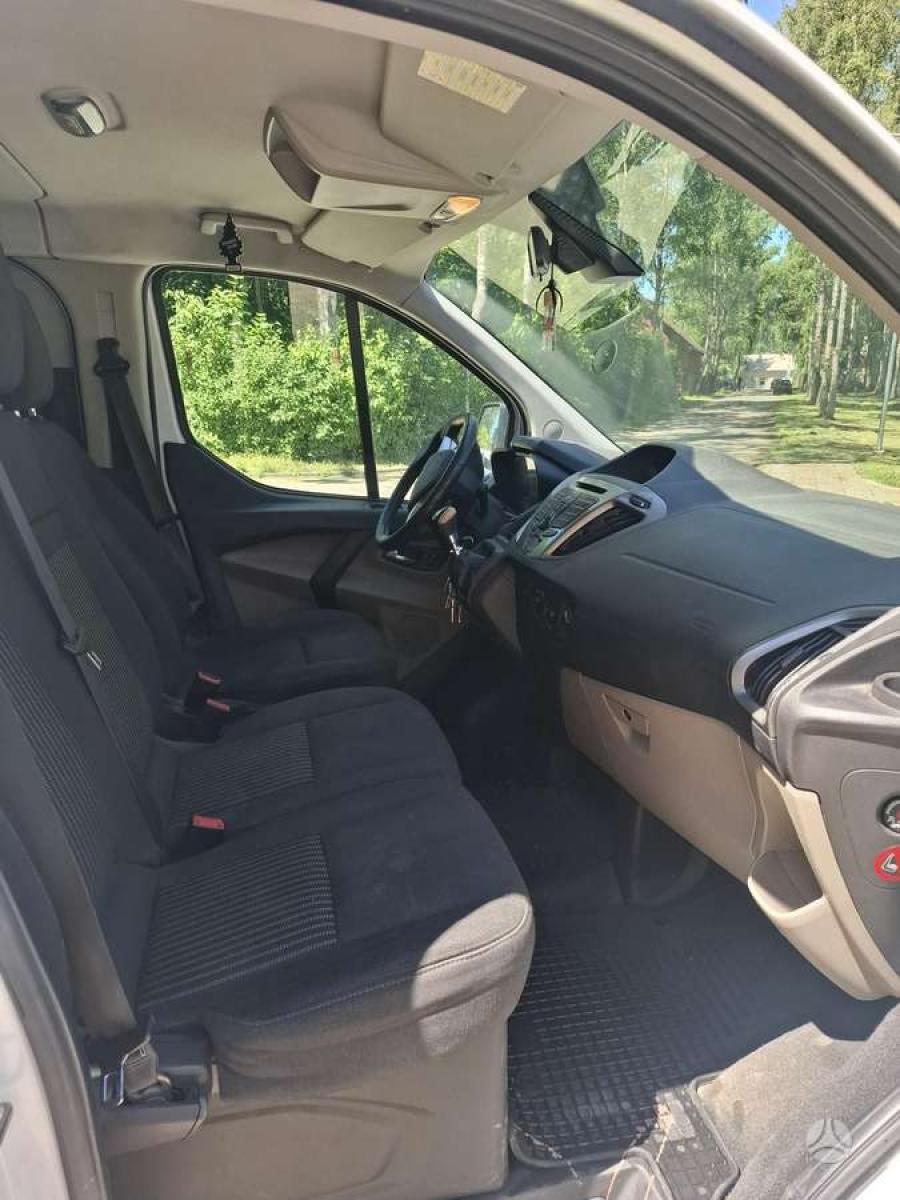 White Ford Tourneo Custom 2014 in Prienai, with an engine capacity of 2.20 L and mileage of 205 thousand km for 7900 €, photo 15 on AUTOMOTO.COM.LV